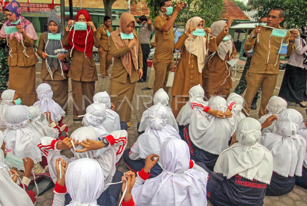PETUGAS DINKES SOSIALISASI PENGGUNAAN MASKER STANDAR KESEHATAN | ANTARA Foto